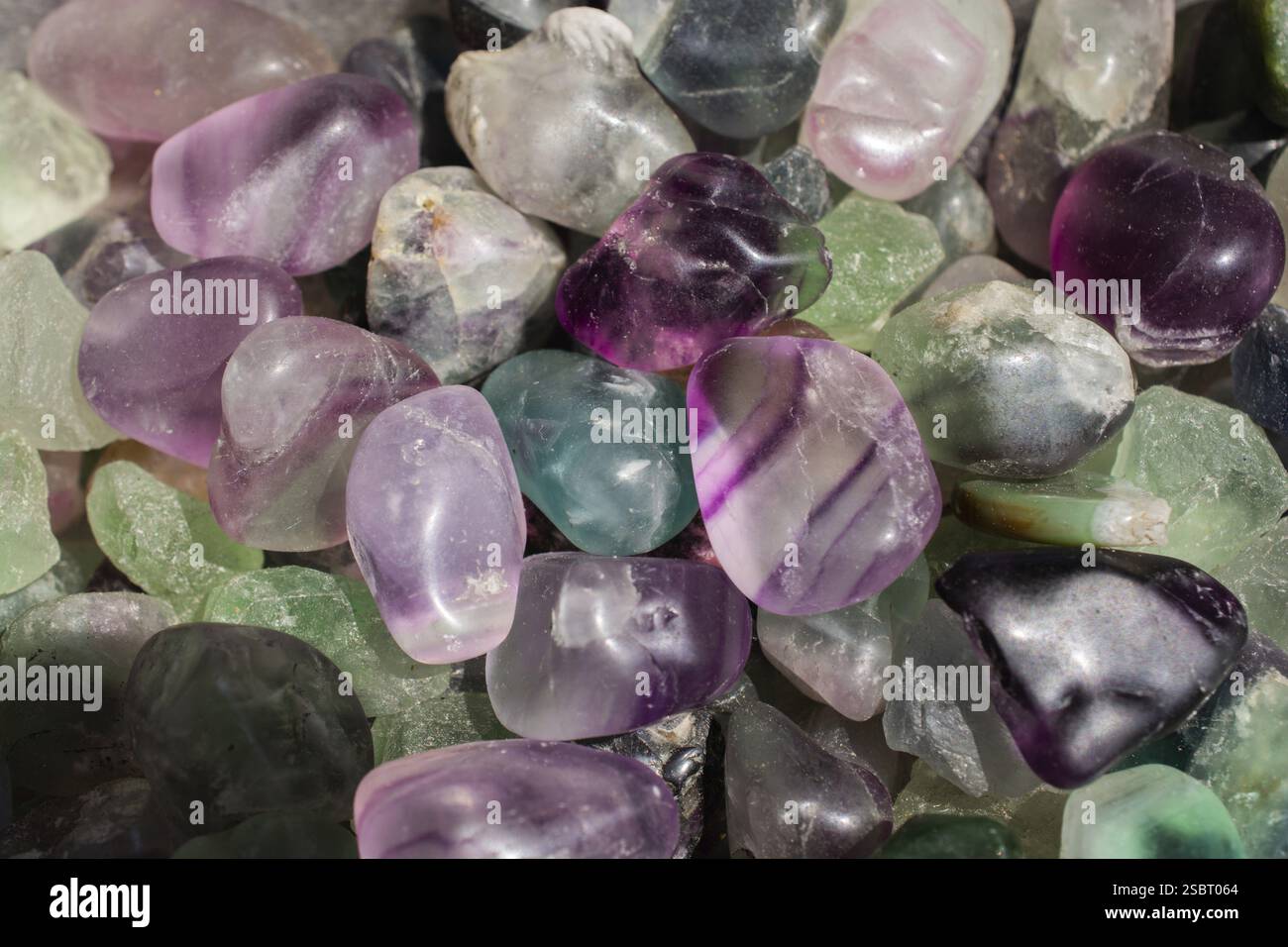 Tumbled Rose Quartz gem stone as mineral rock specimen Stock Photo - Alamy