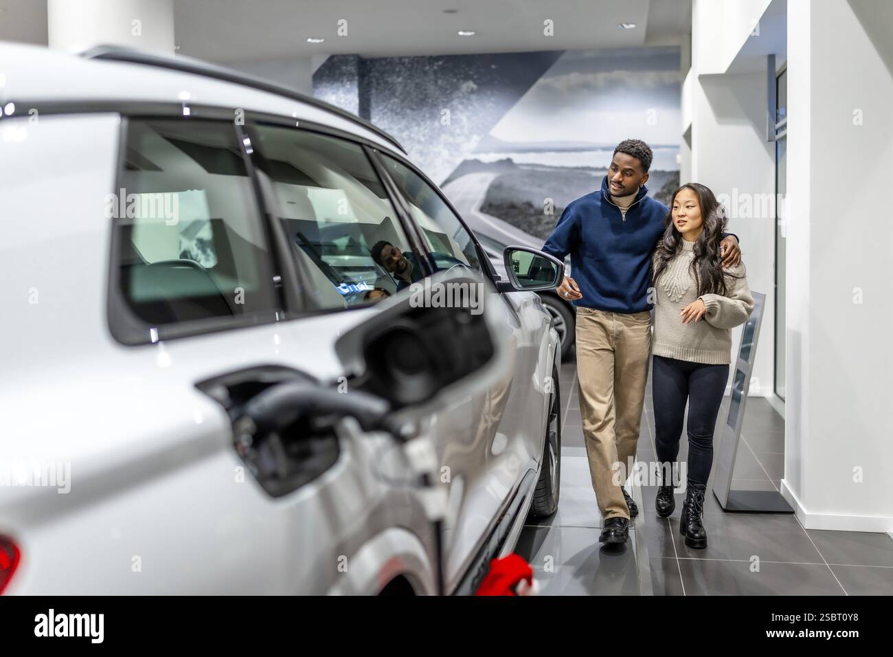 Car exhibition people walking buying hi-res stock photography and ...