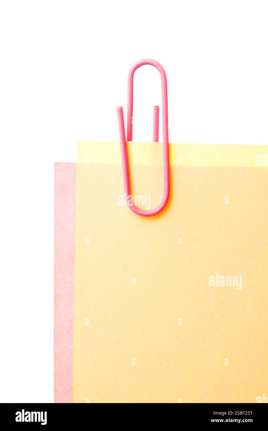 sheets of stapled paper clips isolated on a white background Stock ...