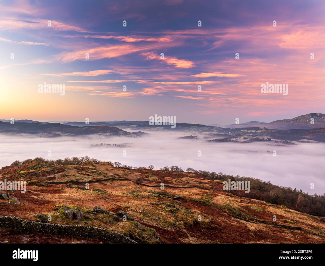 A temperature inversion over Lake Windermere, Lake District UK at dawn ...