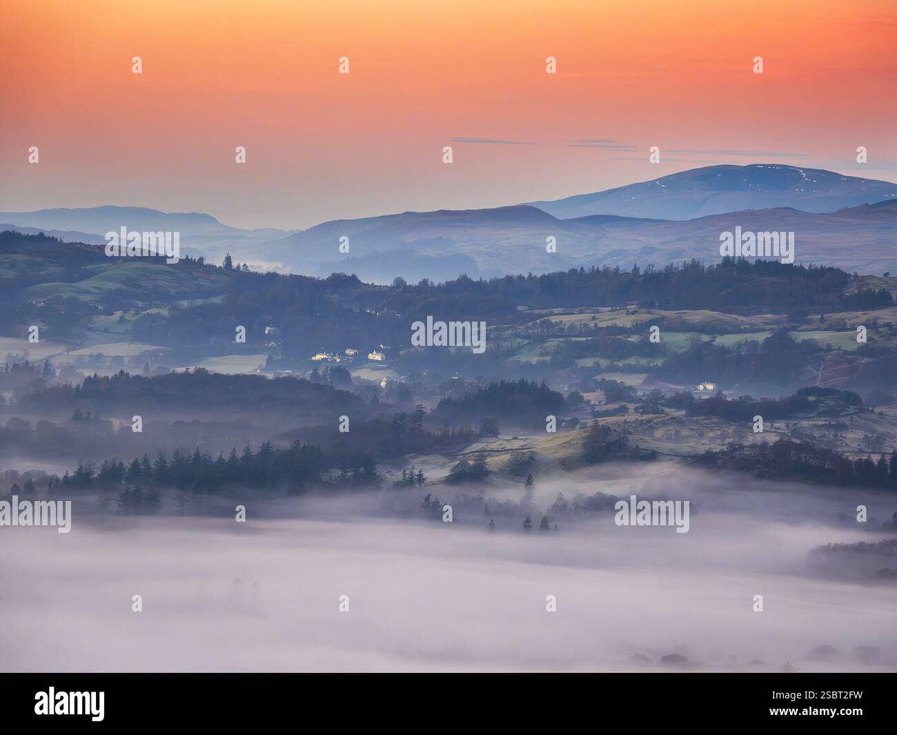 A temperature inversion over Lake Windermere, Lake District UK at dawn ...