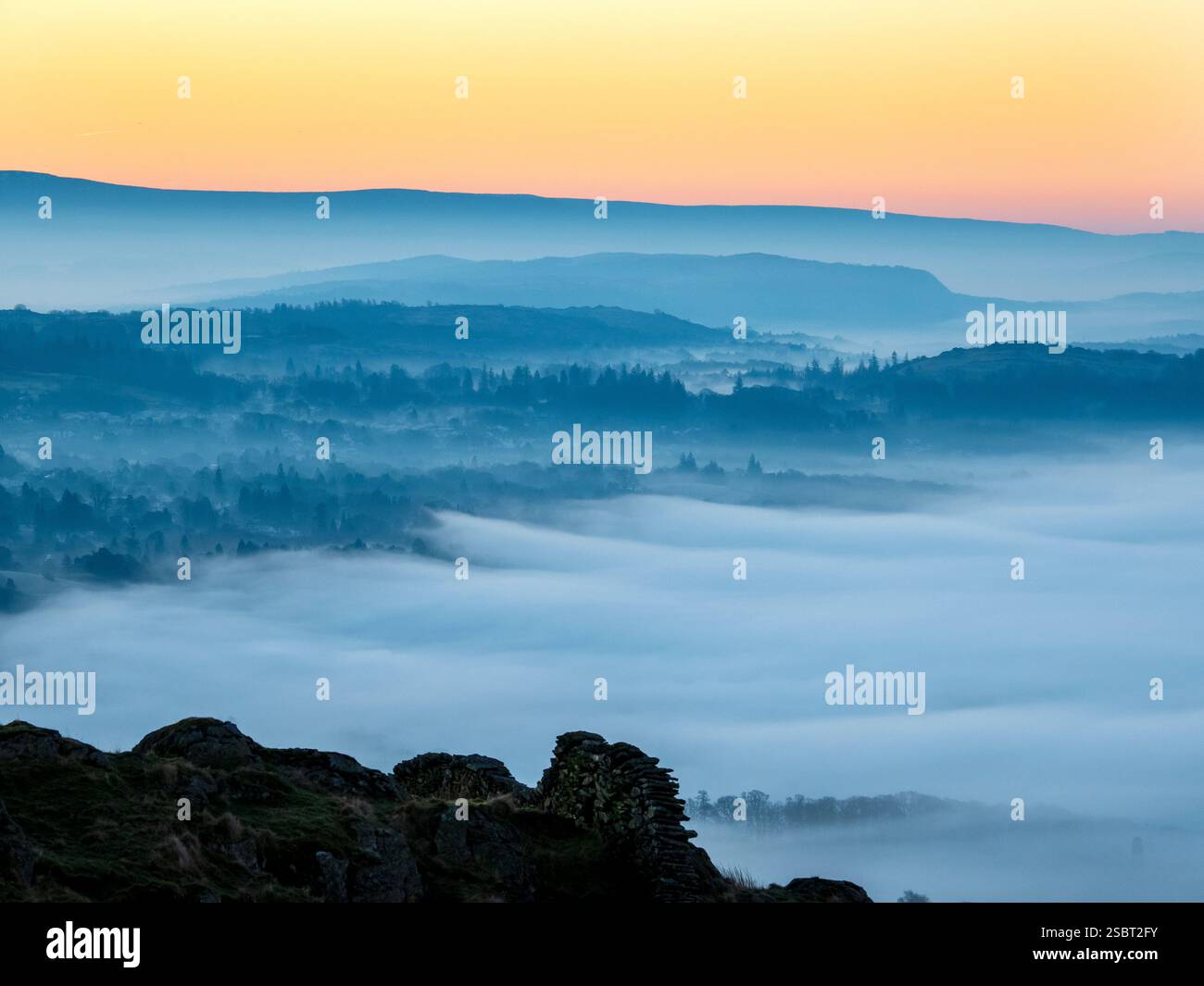 A temperature inversion over Lake Windermere, Lake District UK at dawn ...