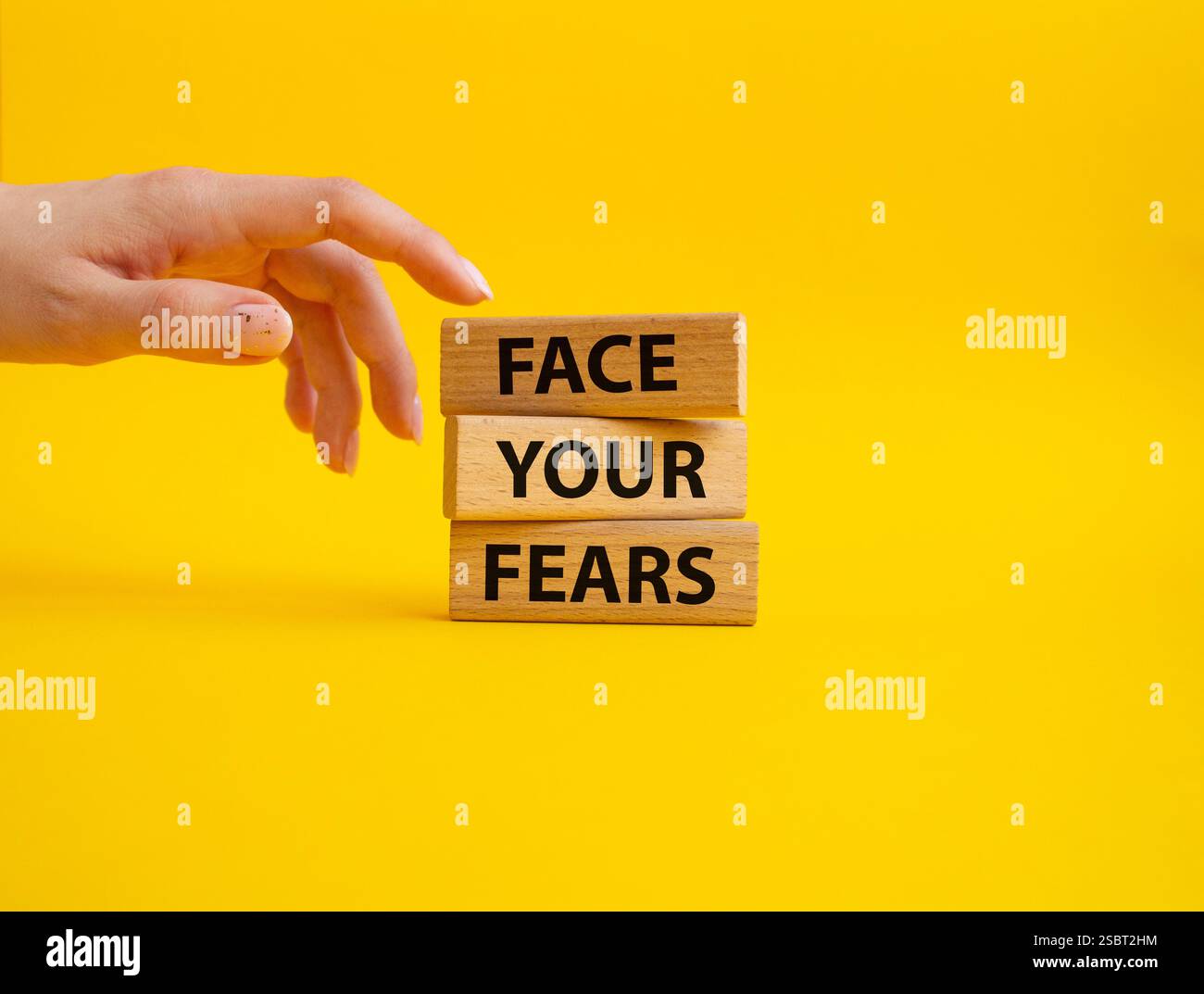 Face your Fears symbol. Wooden blocks with words Face your Fears ...