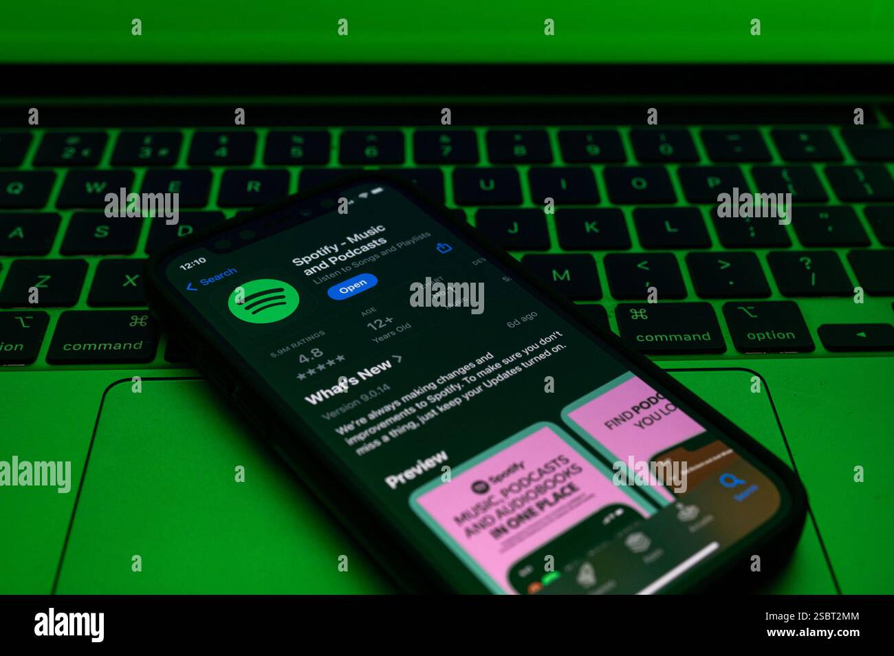 In this photo illustration, the Spotify app seen displayed on a ...