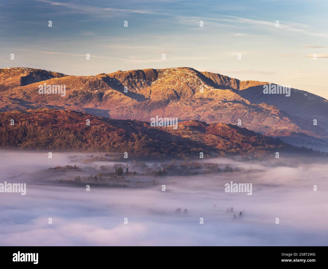 A temperature inversion over Lake Windermere, Lake District UK at dawn ...