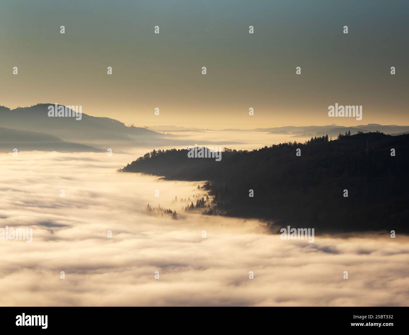 A temperature inversion over Lake Windermere, Lake District UK at dawn ...