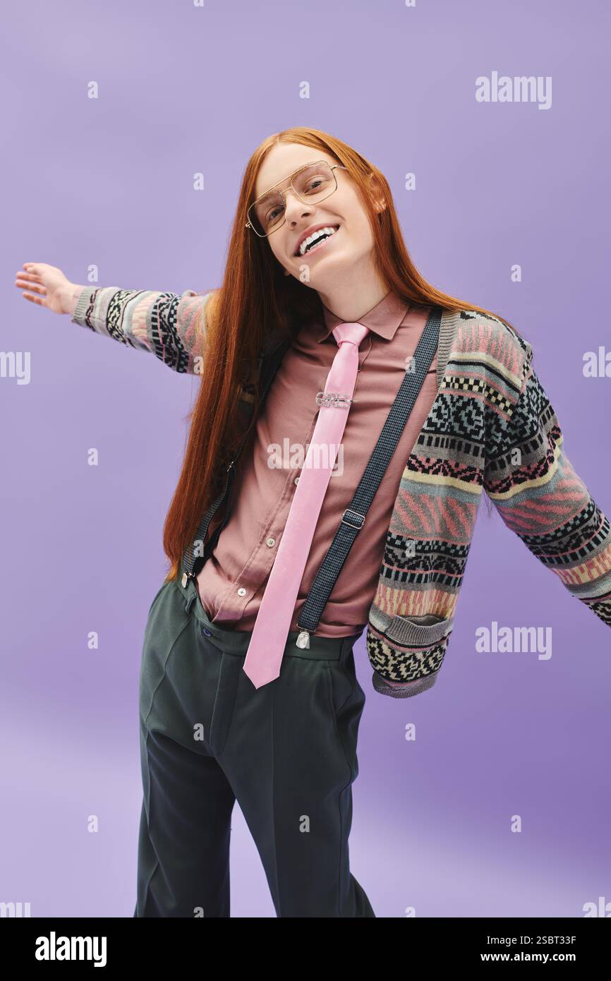A trendy person with long red hair joyfully flaunts their stylish ...