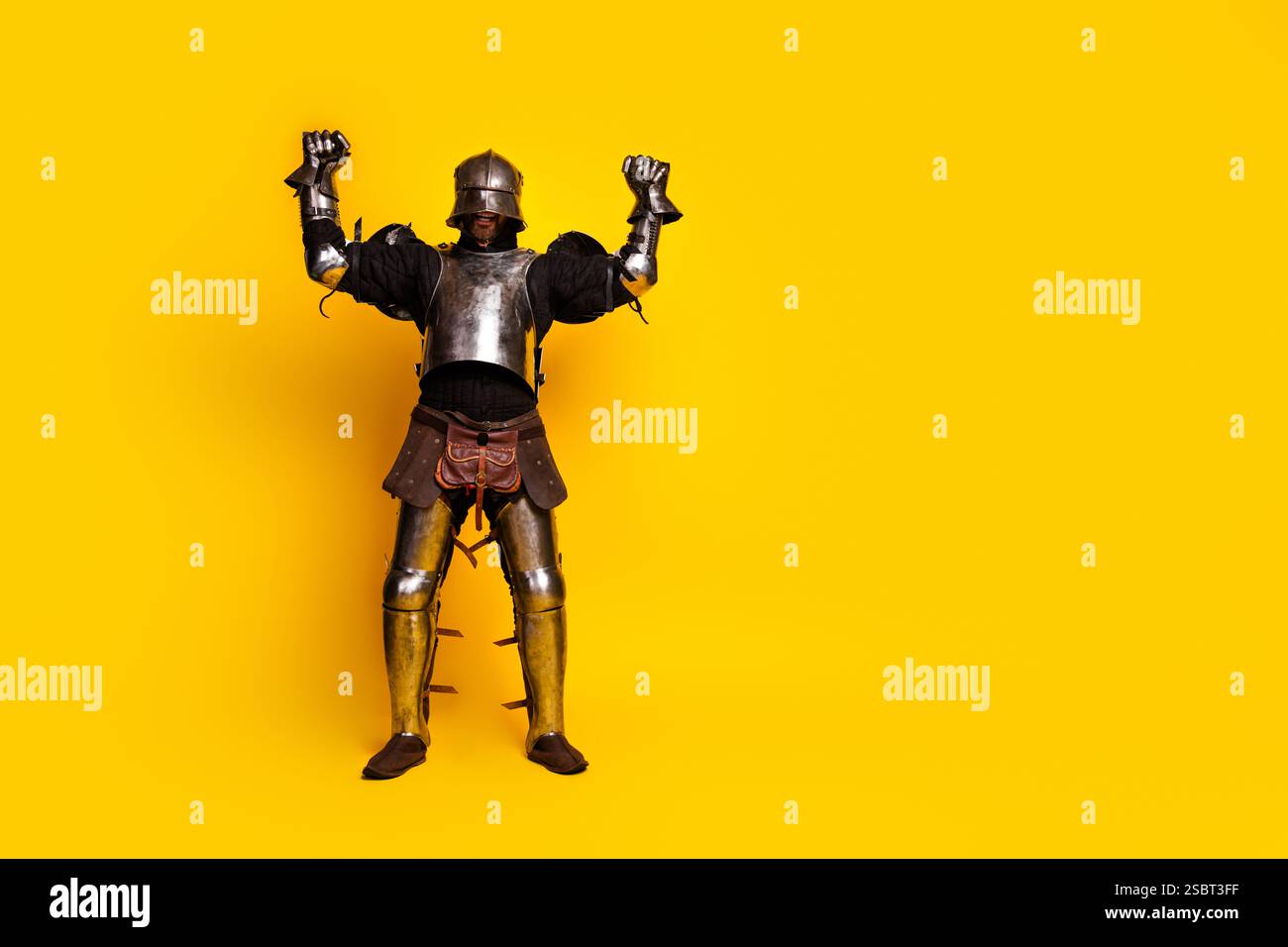 A man in medieval knight armor posing dynamically against a vibrant ...