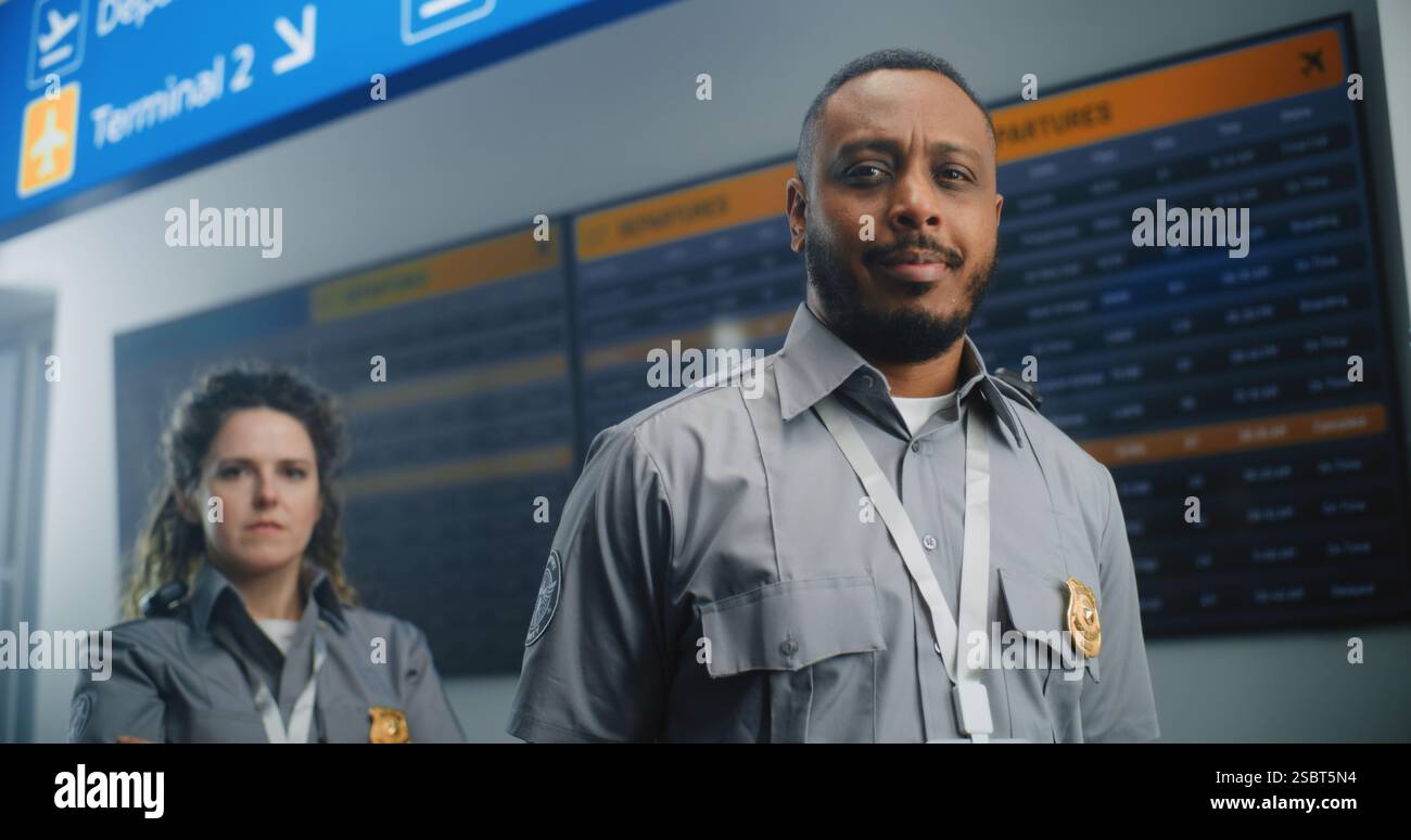 Portrait of Professional Security Officers in International Airport ...