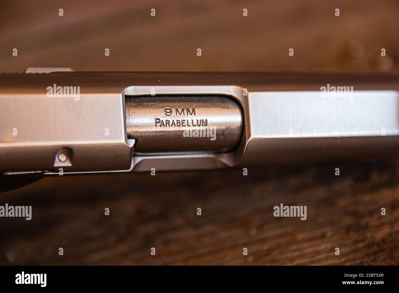 Top view of a stainless steel 45 semiautomatic handgun with 9MM ...