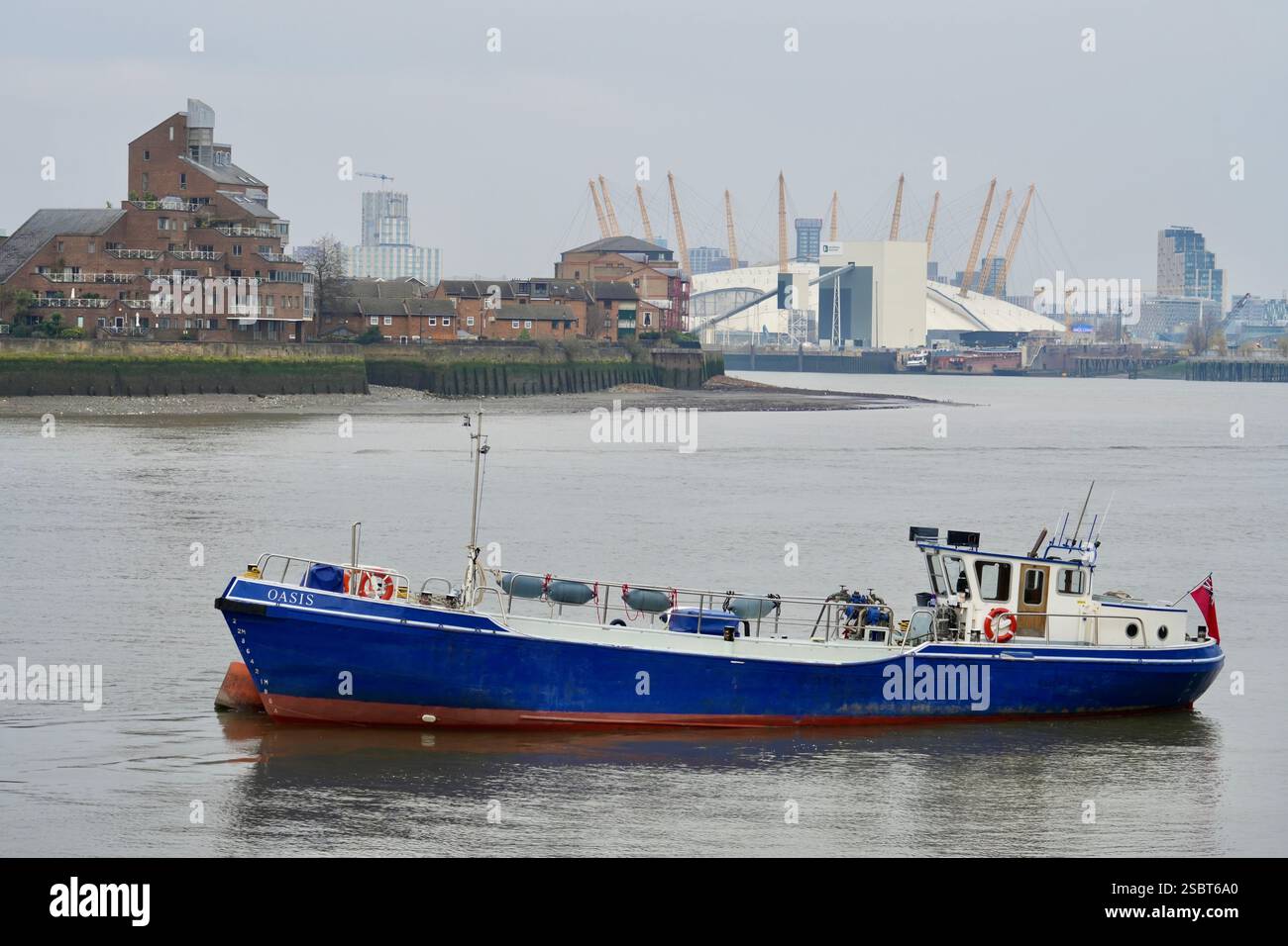 Fresh water bunker barge OASIS on The Rover Thames with The O2 arena ...