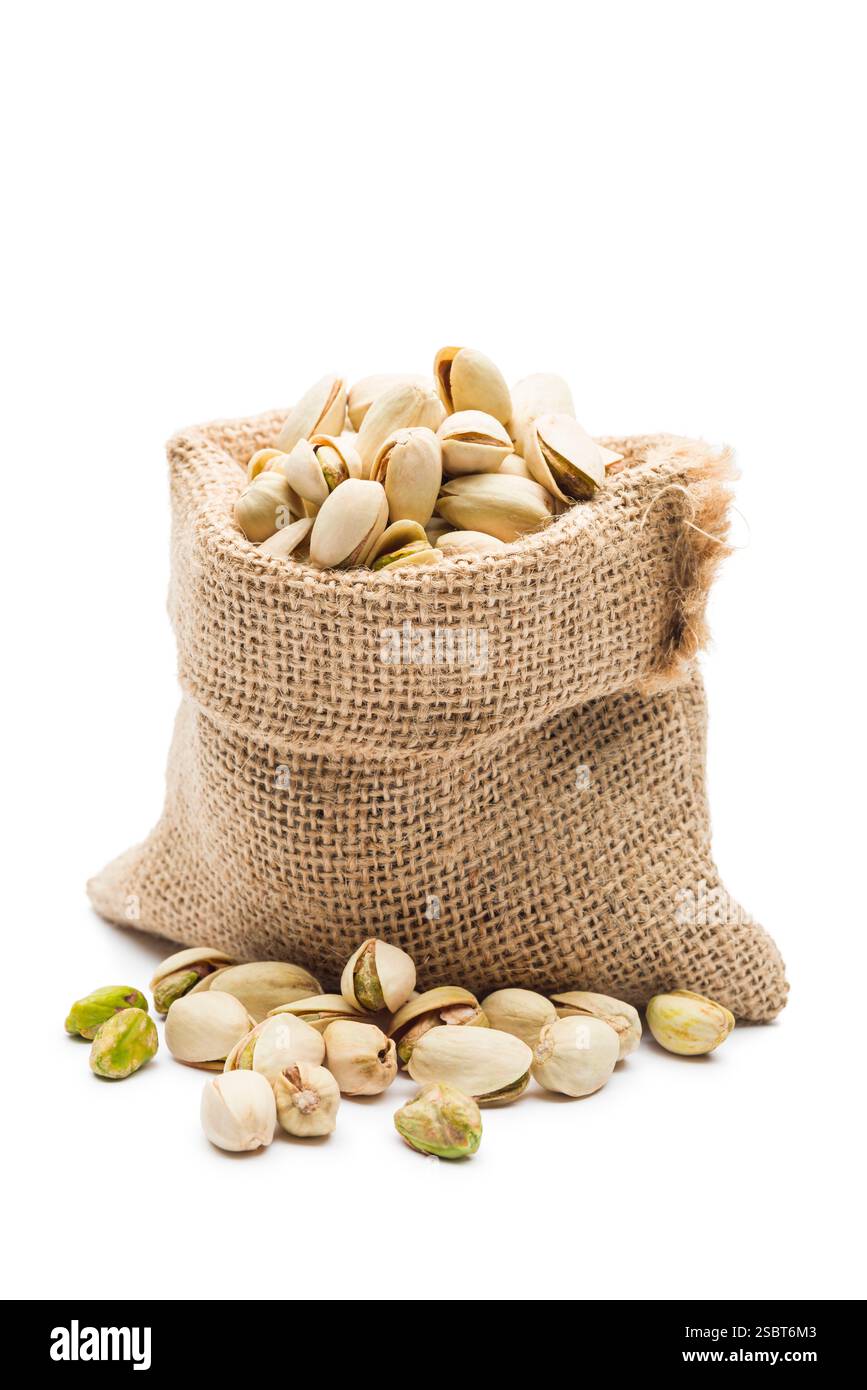 Sack with pistachio nuts, isolated on white background Stock Photo - Alamy