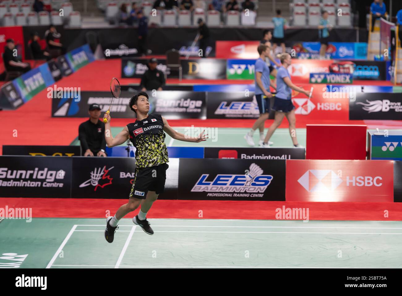 Arnaud Merkle (France) compete against Koki Watanabe (Japan) in men's single match at the 2023 ...