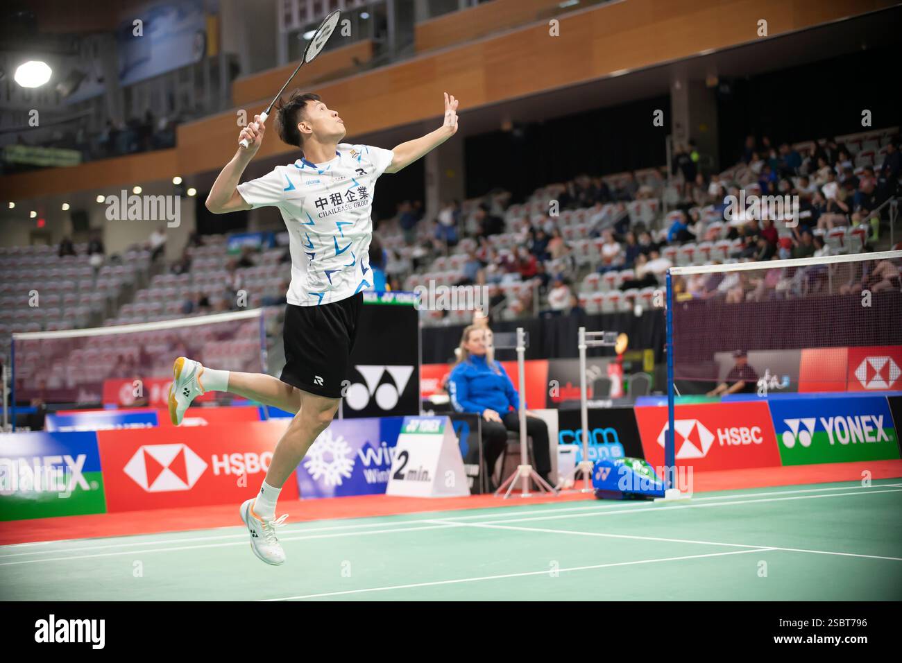 Kenta Nishimoto (Japan) compete against CHI Yu Jen (Chinese Paipei) in the men's singles at the ...