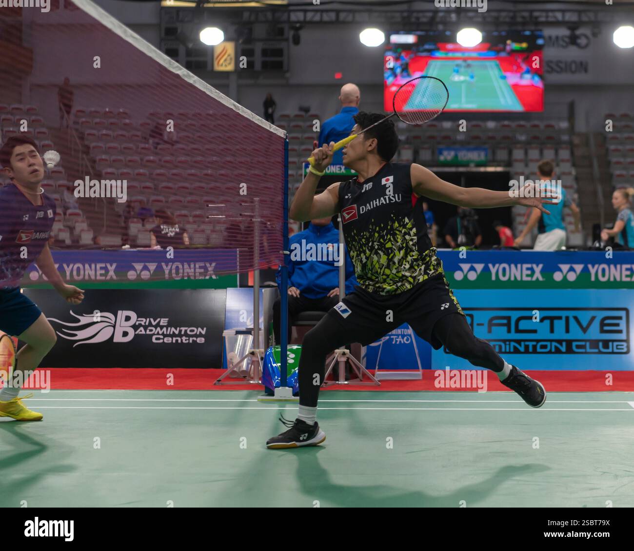 Akira KOGA and Taichi SAITO (Japan) compete against Lucas CORVEE and ...