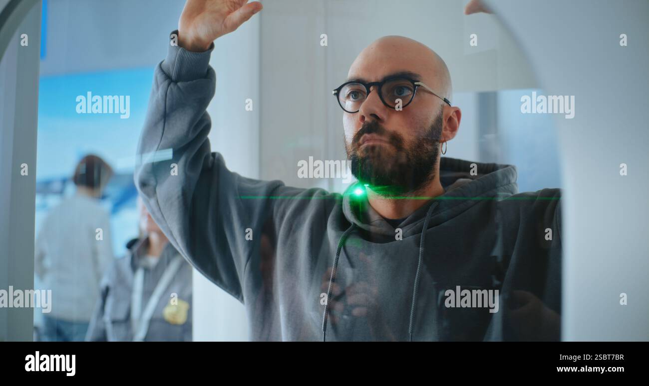 TSA Security Checkpoint in Airport Terminal: Adult Man Passing Through ...