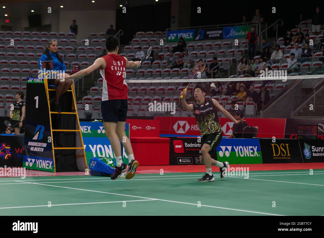 Li Shi Feng (China) compete against Koki Watanabe (Japan) in men's singles match at the 2023 BWF ...