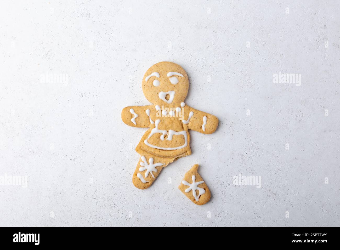 Gingerbread man with a broken leg (without leg) and with a surprised ...