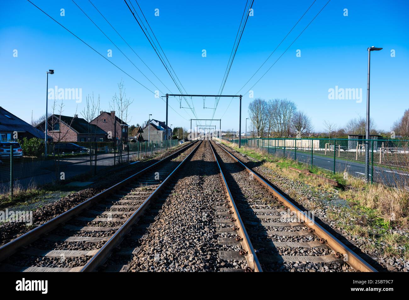 Double railway tracks of a local line at the Belgian countryside, Asse ...