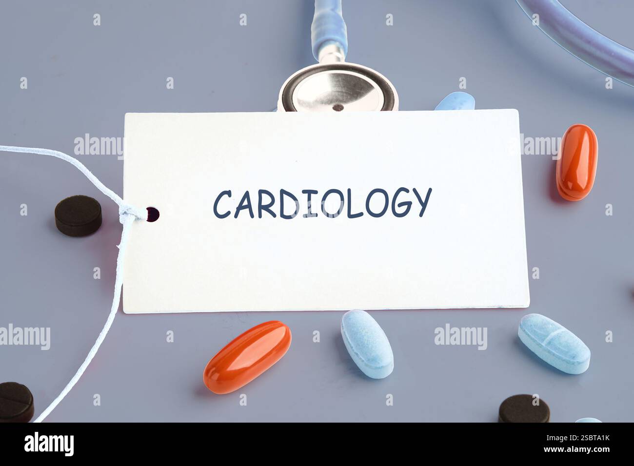 Focus on cardiology education with medication, a stethoscope, and ...