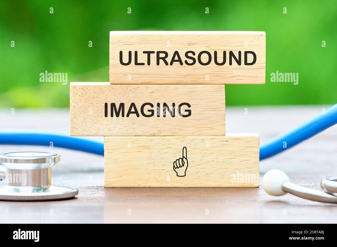 Ultrasound images on wooden blocks with a stethoscope highlight their ...