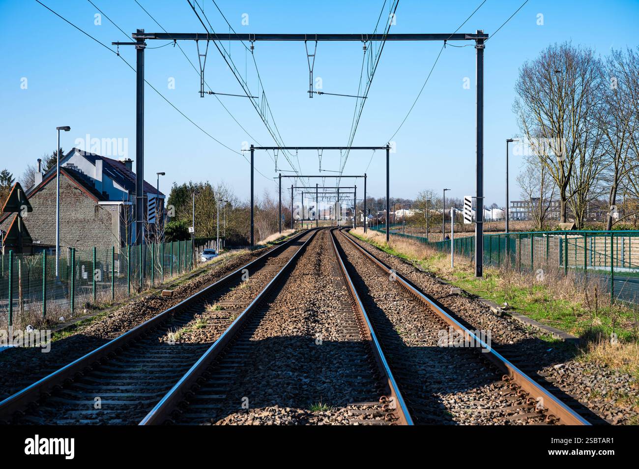 Double railway tracks of a local line at the Belgian countryside, Asse ...