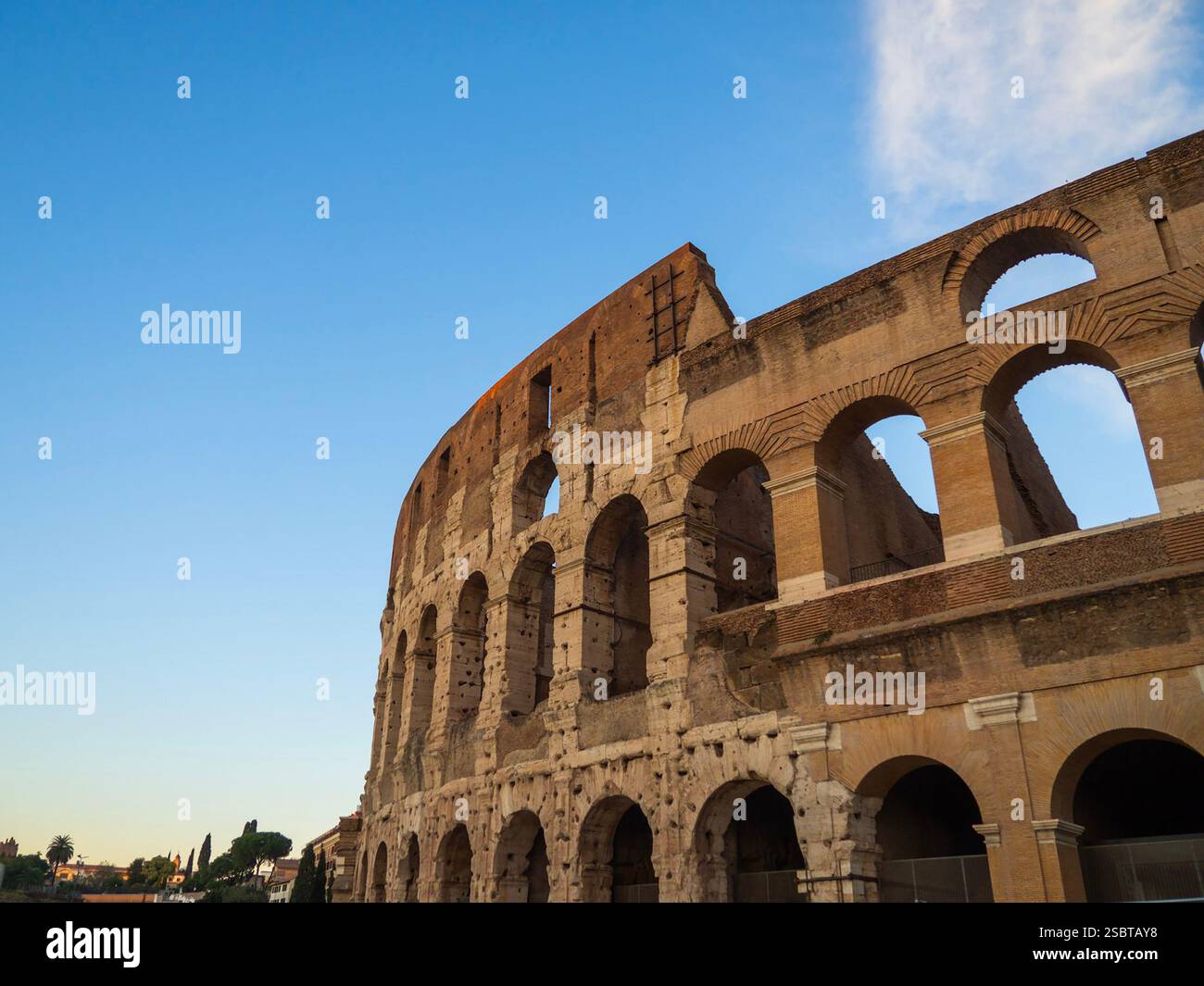 A stunning view of the Colosseum in Rome, showcasing its ancient stone ...