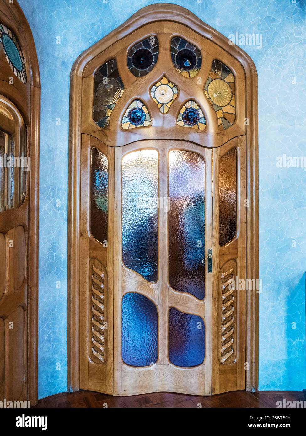 A door inside the Casa Batlló designed by Antoni Gaudi, in Barcelona ...