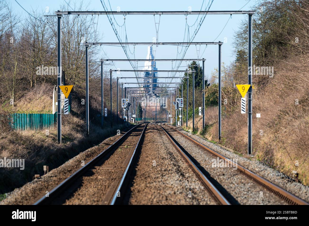 Double railway tracks of a local line at the Belgian countryside, Asse ...