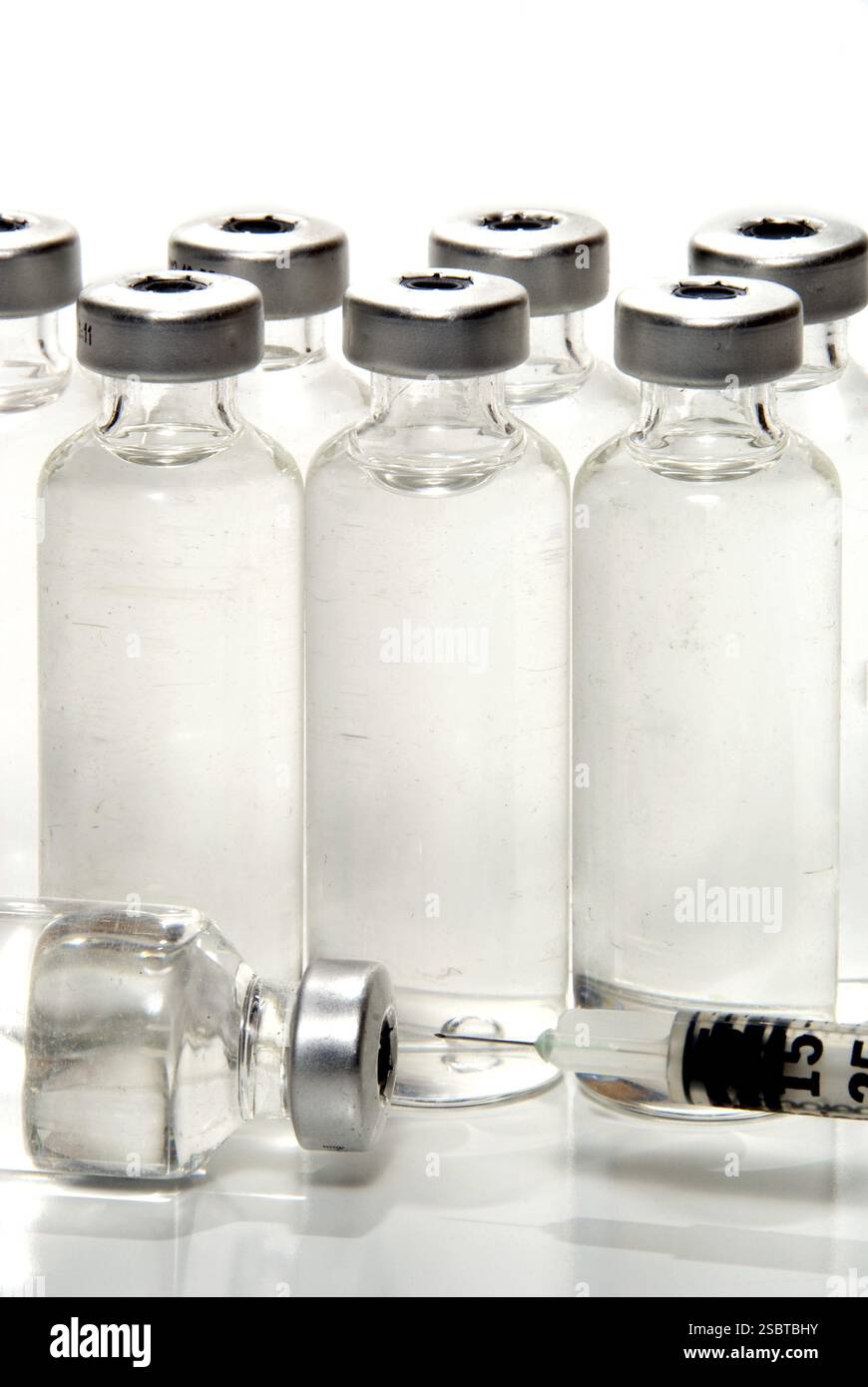 A prescription medicine vial and a syringe Stock Photo - Alamy