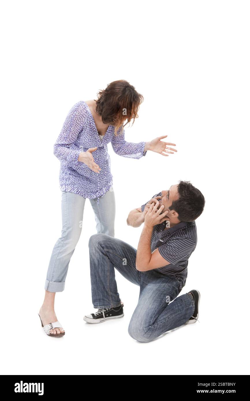 Angry couple yelling at each other isolated over white Stock Photo - Alamy