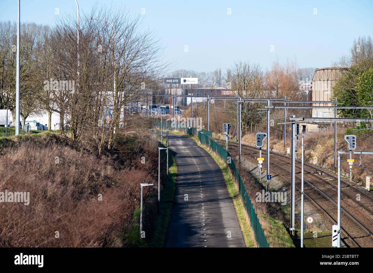 Railway tracks, cycling road and the BOMACO and PIVO site in Zellik ...