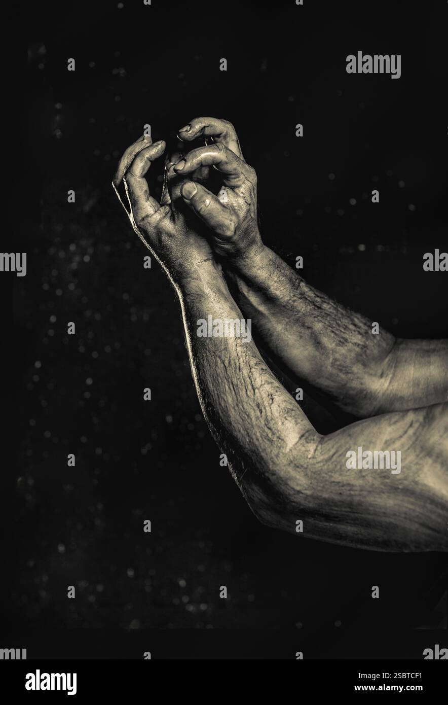 Close-up of a man's arm. Strong and power man's hand. Low key shoot ...