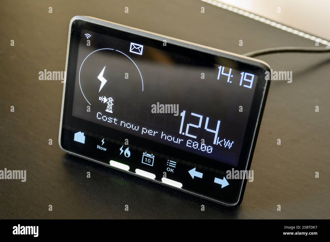 Closeup of domestic smart meter with display showing electricity export ...