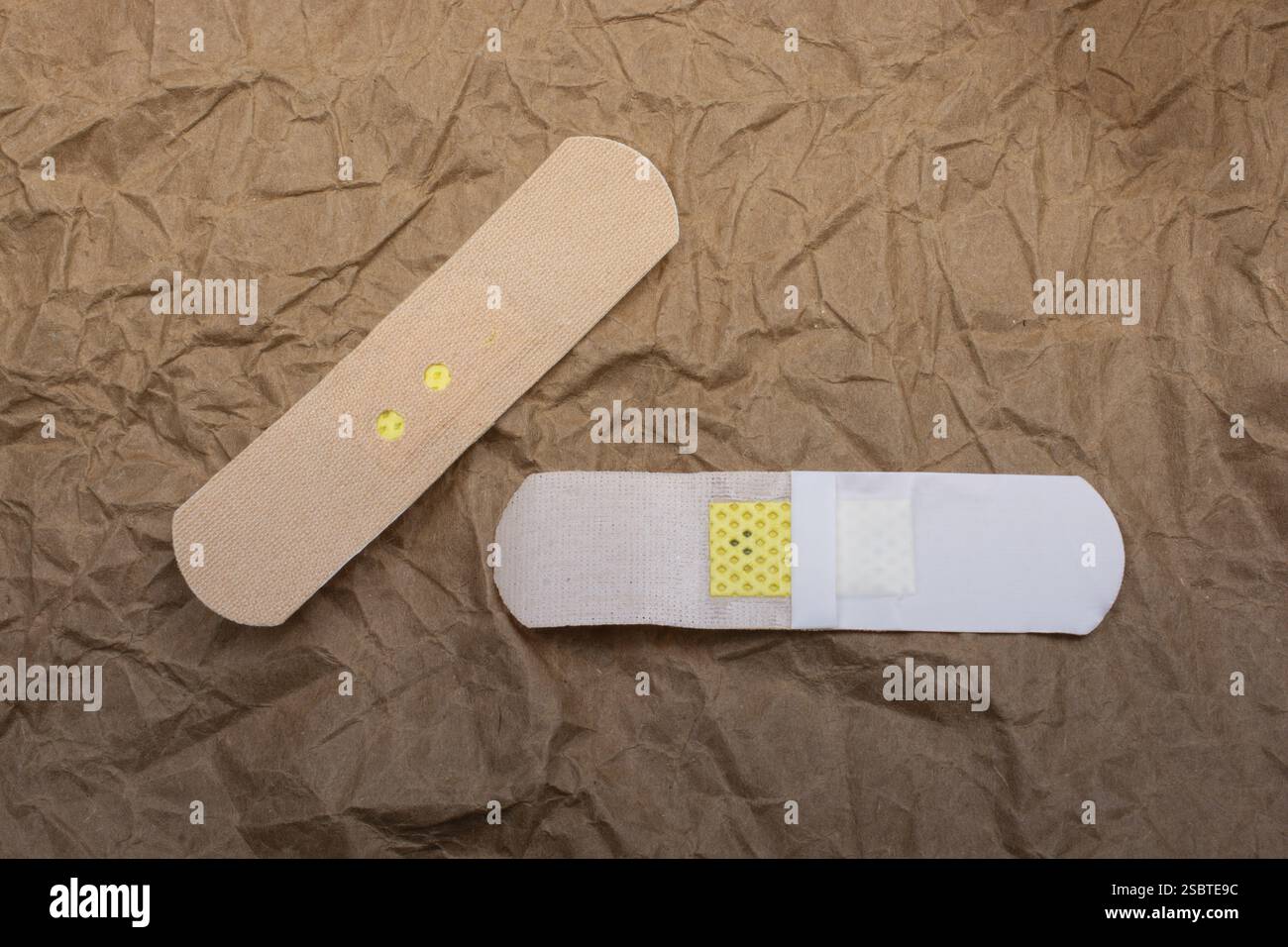 Dressing plasters, wound cross plastering band Stock Photo - Alamy