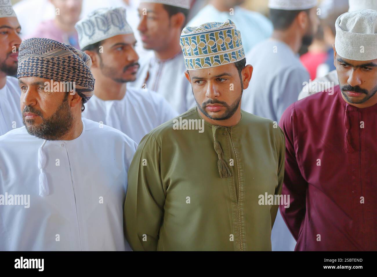 NIZWA, AL DAKHILIYAH, OMAN - DECEMBER 20, 2024: Portrait of Omani men ...