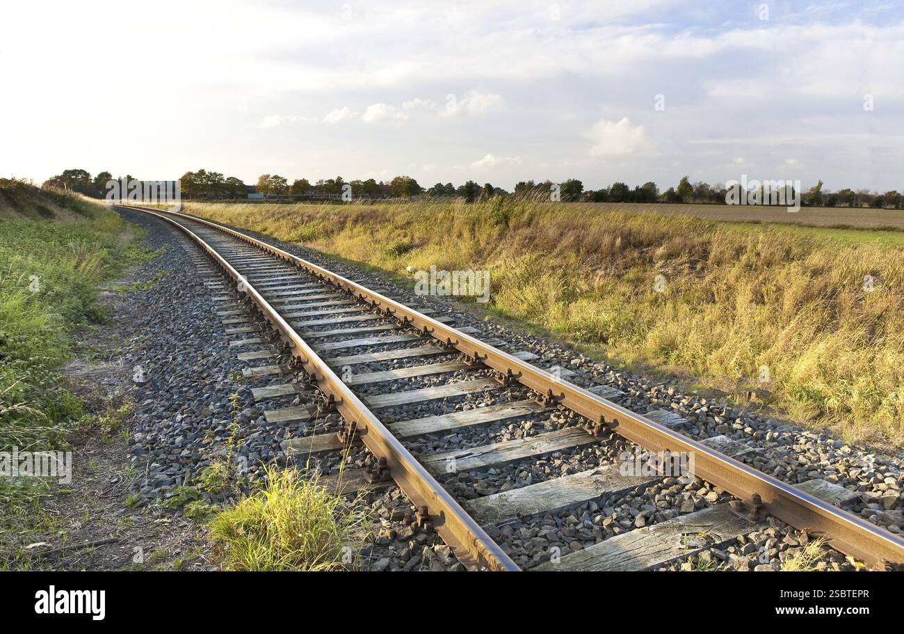 Landscape with old railway track, at sunset Stock Photo - Alamy