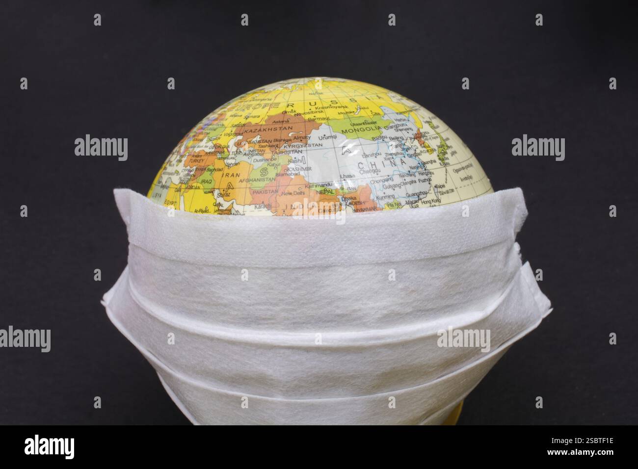 Planet Earth with face mask. World medical concept Stock Photo - Alamy