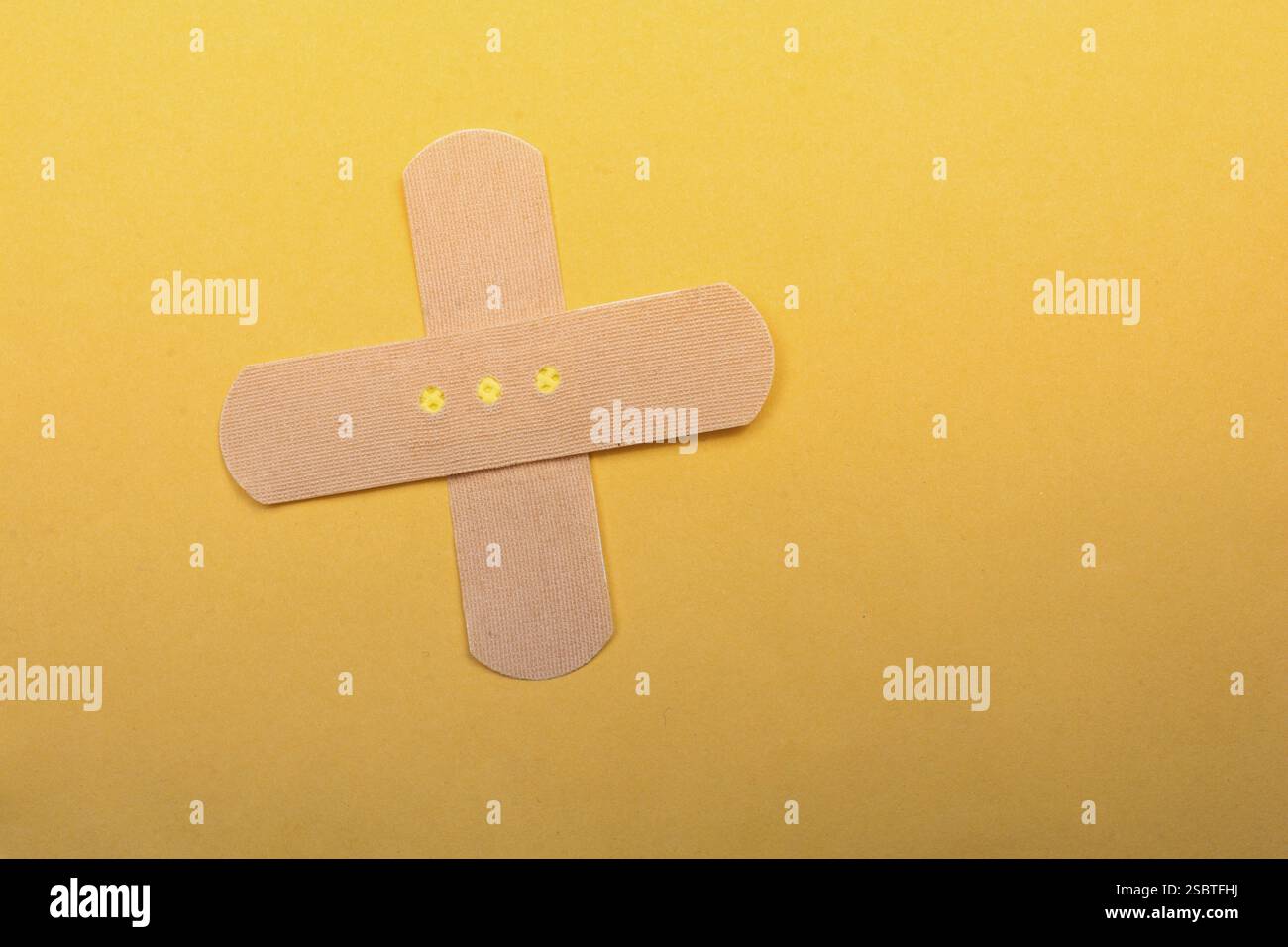 Dressing plasters, wound cross plastering band Stock Photo - Alamy