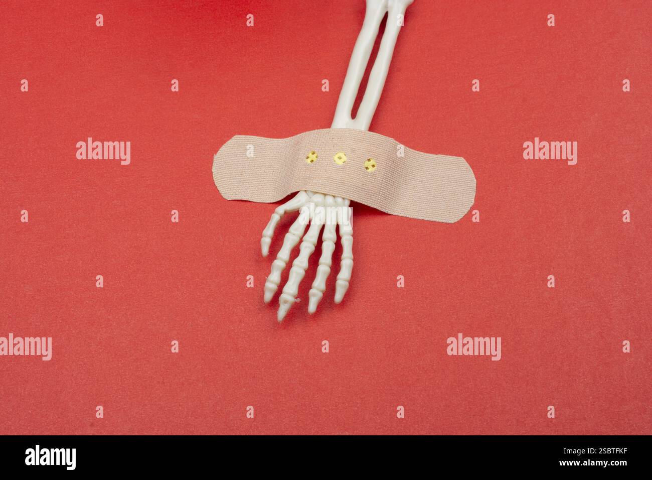 Plaster band on Skeletal hands for death and mistery concept Stock ...