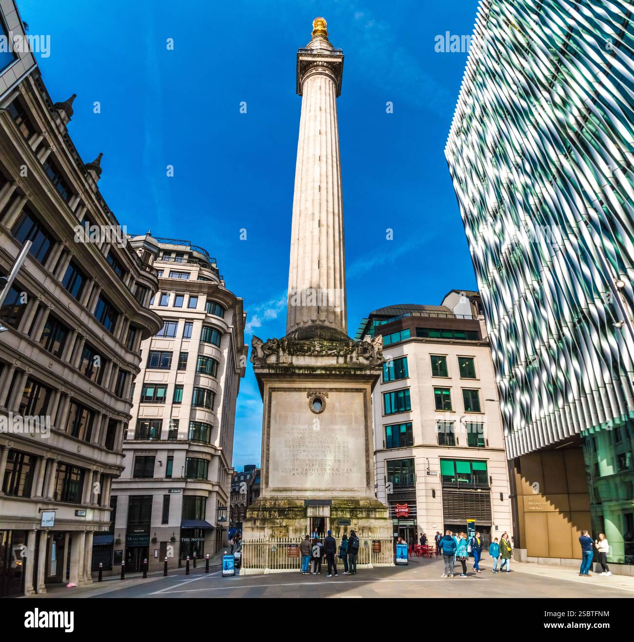 Great view of the famous Monument to the Great Fire of London, a fluted ...