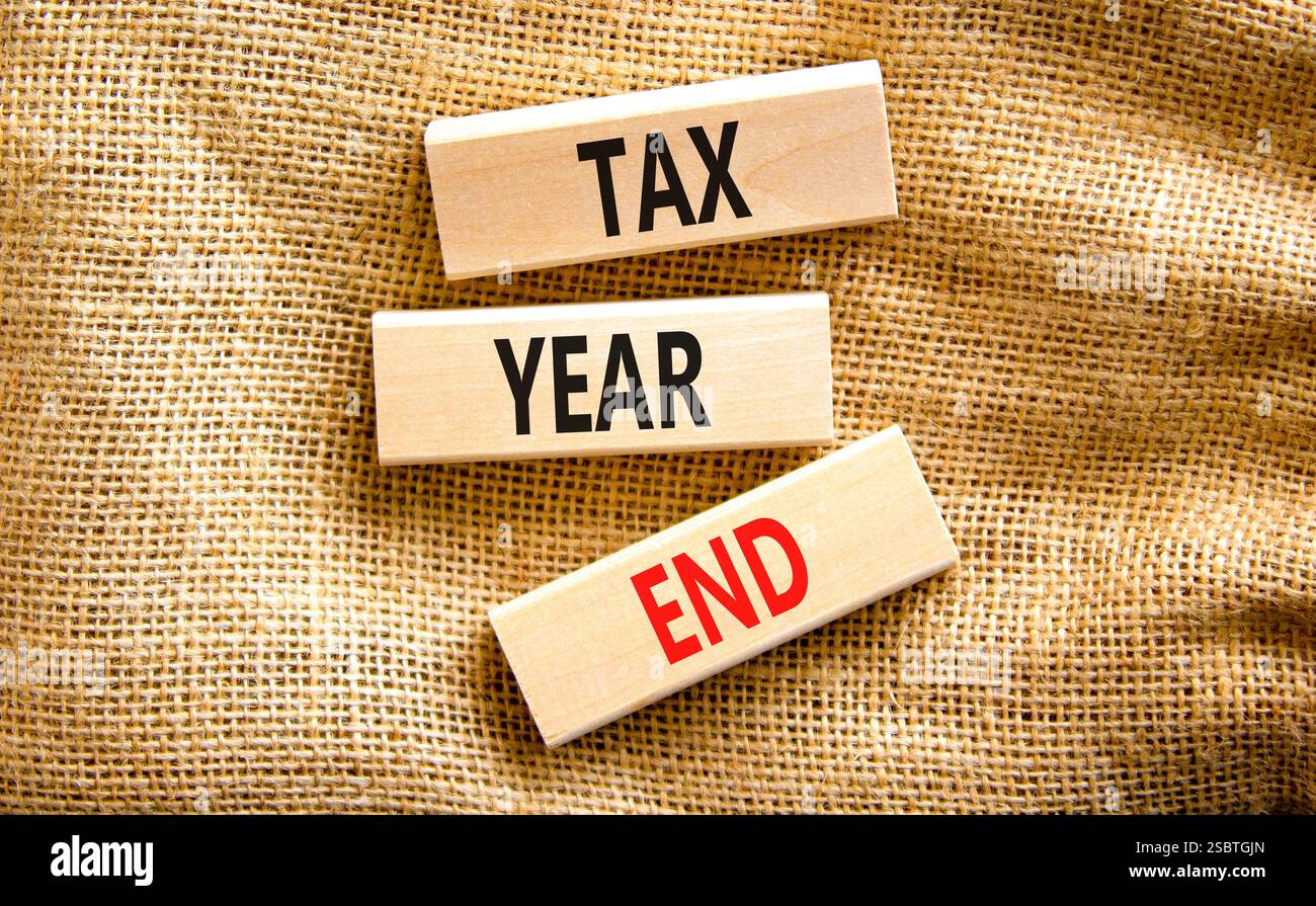 Tax year end symbol. Concept words Tax year end on beautiful wooden ...