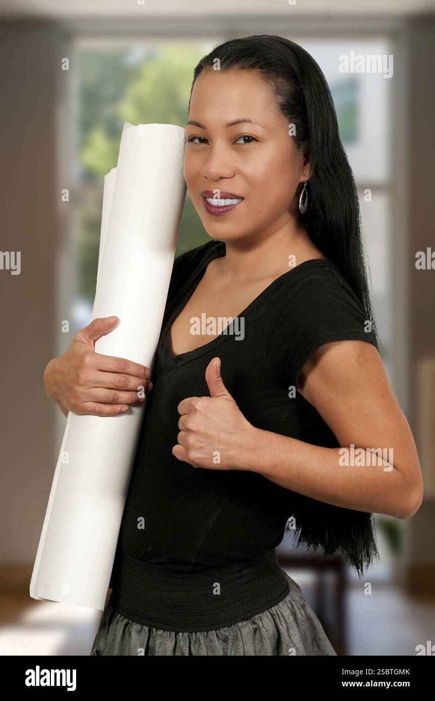 A beautiful young upwardly mobile business woman Stock Photo - Alamy