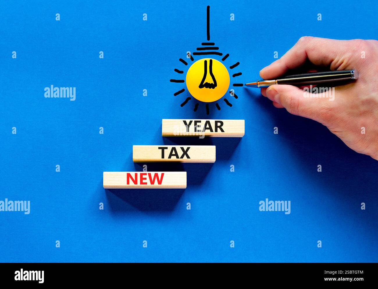 New tax year symbol. Concept words New tax year on beautiful wooden ...