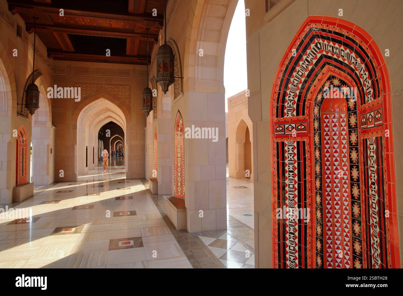 The Sultan Qaboos Grand Mosque in Muscat, Oman, with archways and ...