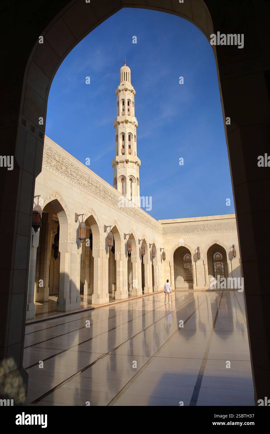 The Sultan Qaboos Grand Mosque in Muscat, Oman, with a courtyard viewed ...