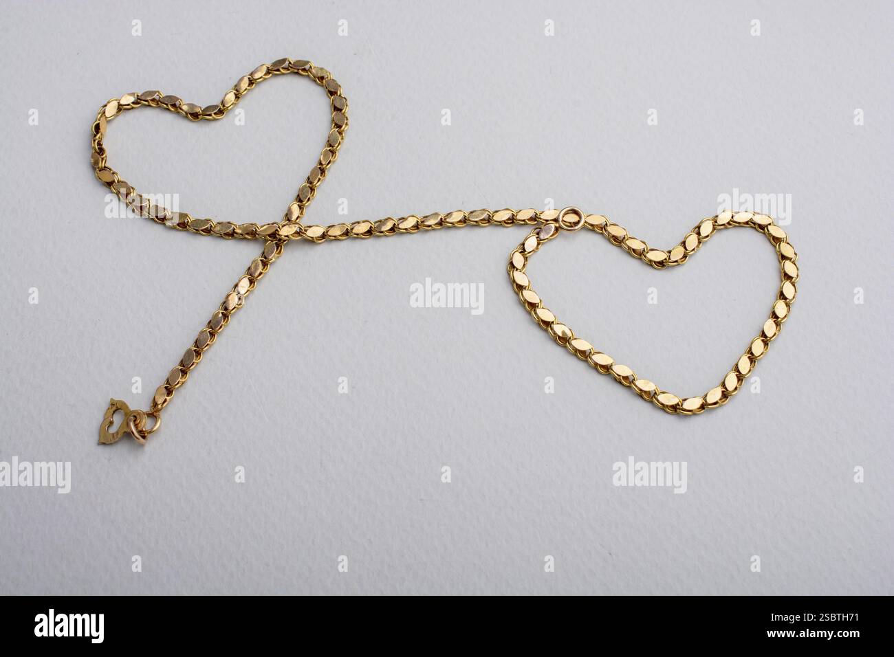 Heart shaped made of gold chain Valentines Day, love, romance concept ...