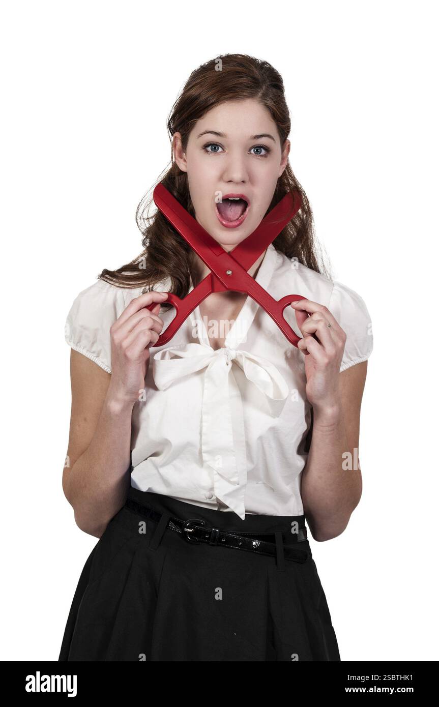 Beautiful woman cutting her neck with scissors Stock Photo - Alamy