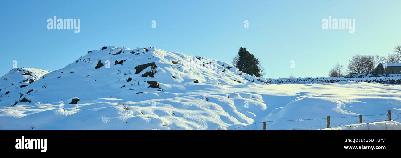 In January, deep overnight snow blankets the quarry spoil heap in ...