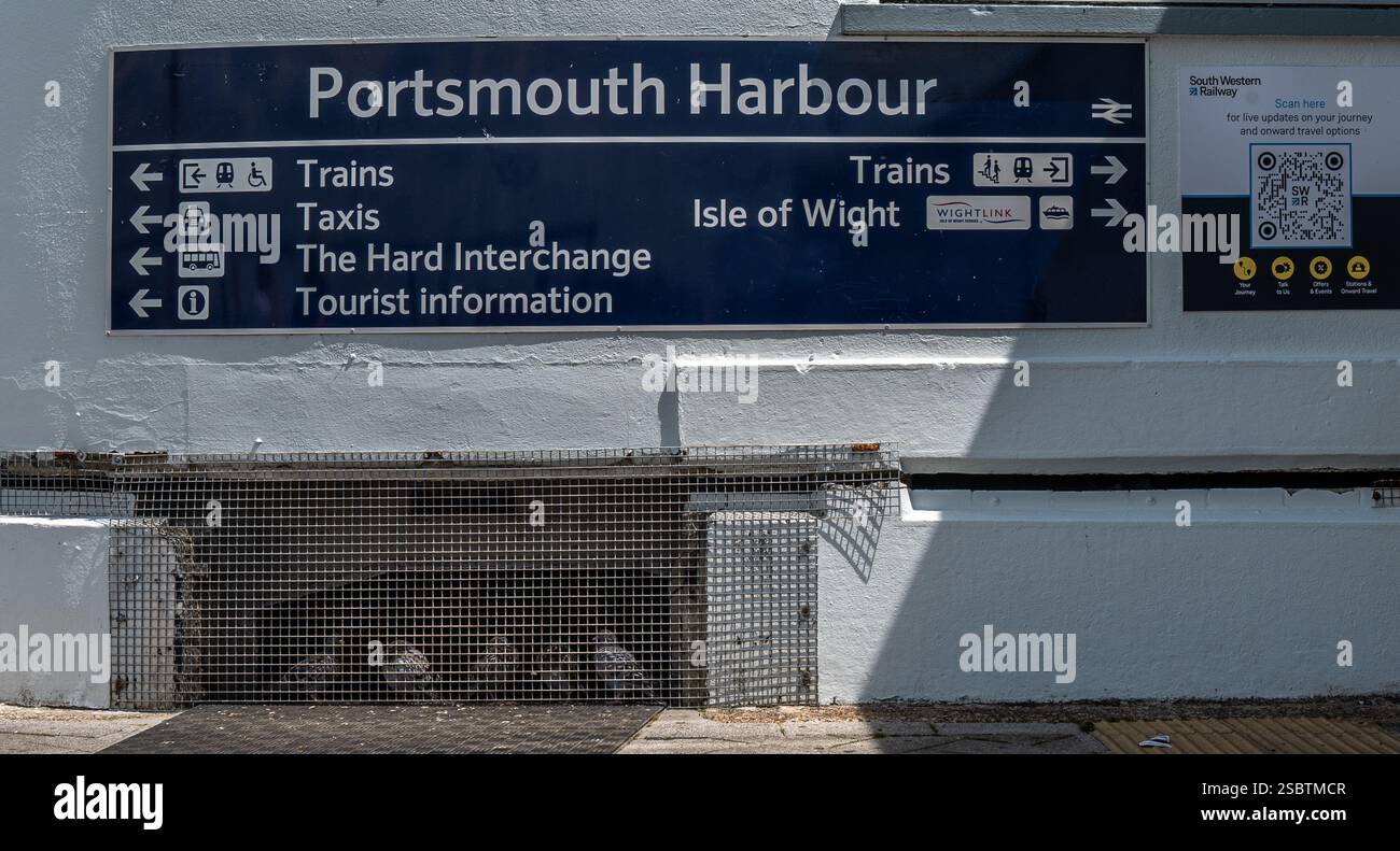 Portsmouth harbour station sign for trains and ferry to Gosport and the ...